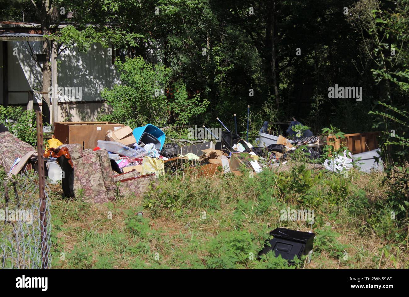 Surrounded by rubbish hi-res stock photography and images - Alamy