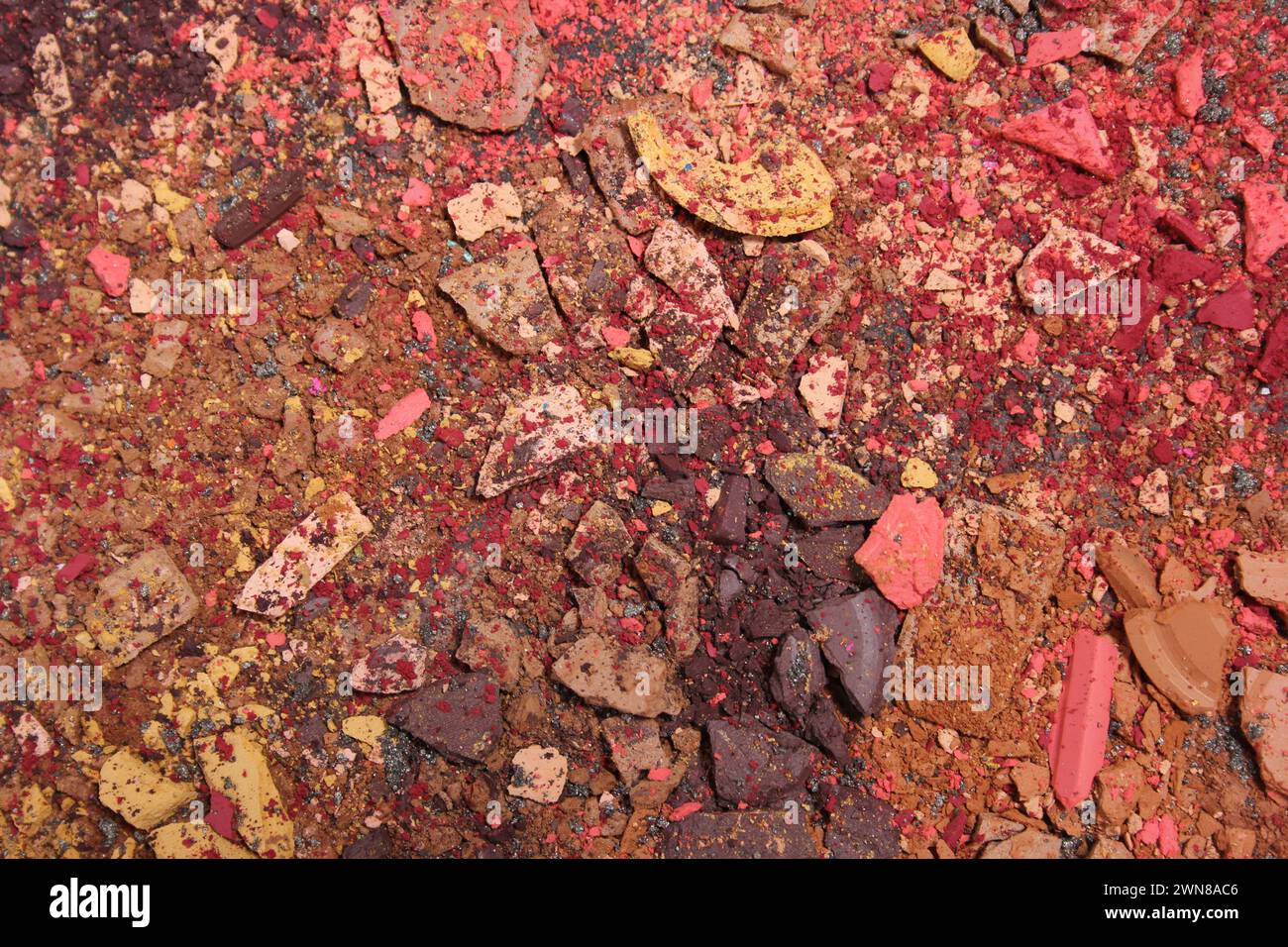 A top view of red and yellow earth and clay on the ground Stock Photo ...