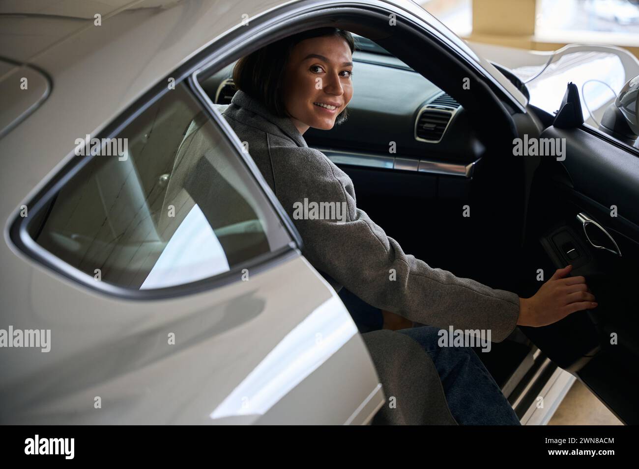 Female exiting car hi-res stock photography and images - Alamy