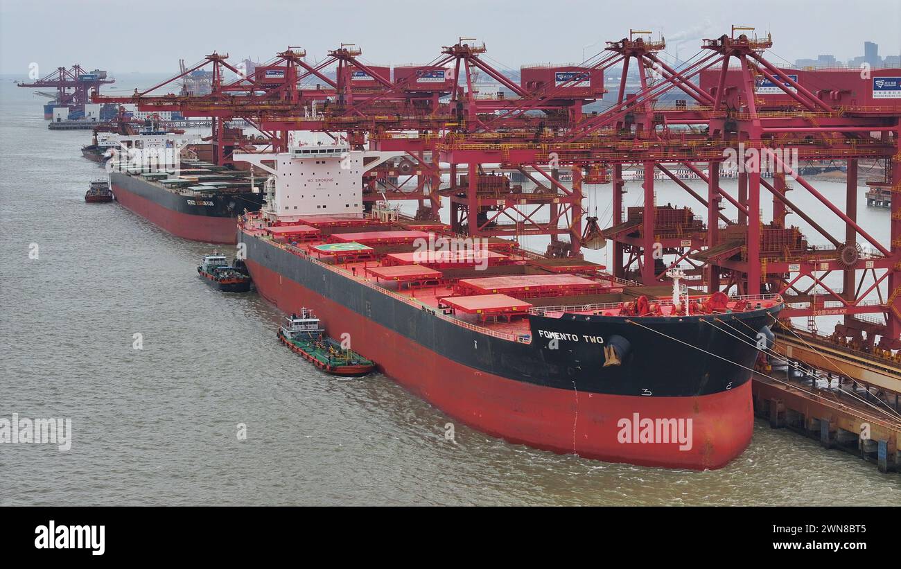 SUZHOU, CHINA - MARCH 1, 2024 - Iron ore imported from abroad is ...