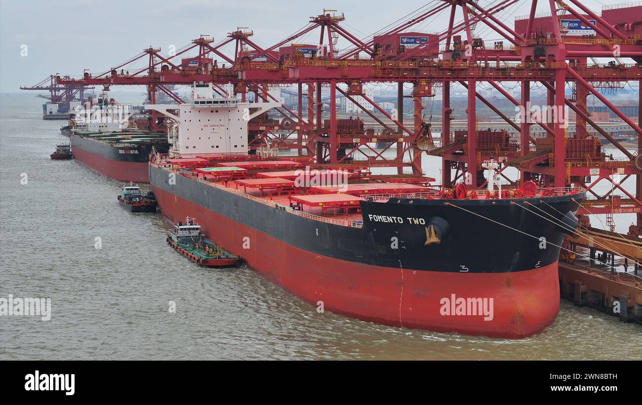 SUZHOU, CHINA - MARCH 1, 2024 - Iron ore imported from abroad is ...