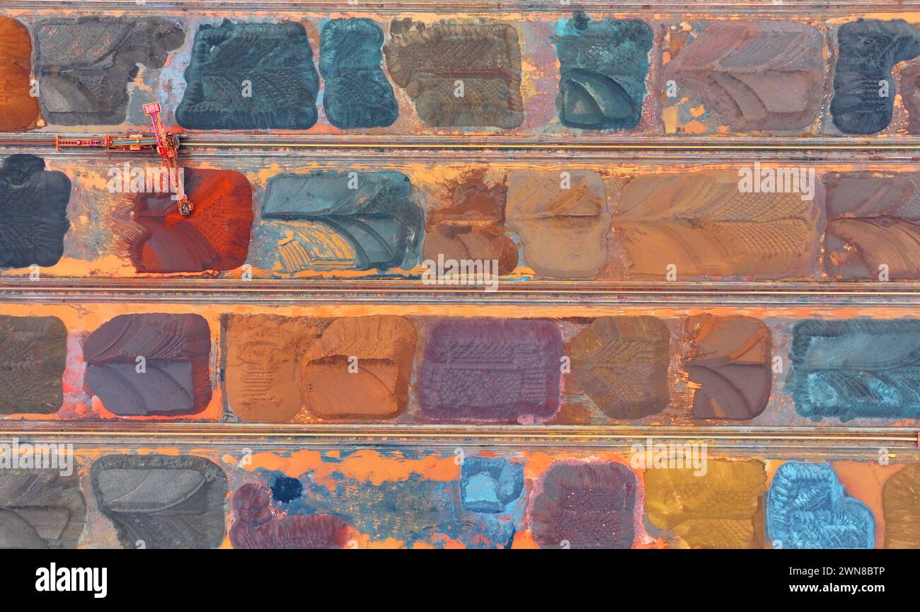 SUZHOU, CHINA - MARCH 1, 2024 - A bucket turbine performs an iron ore ...