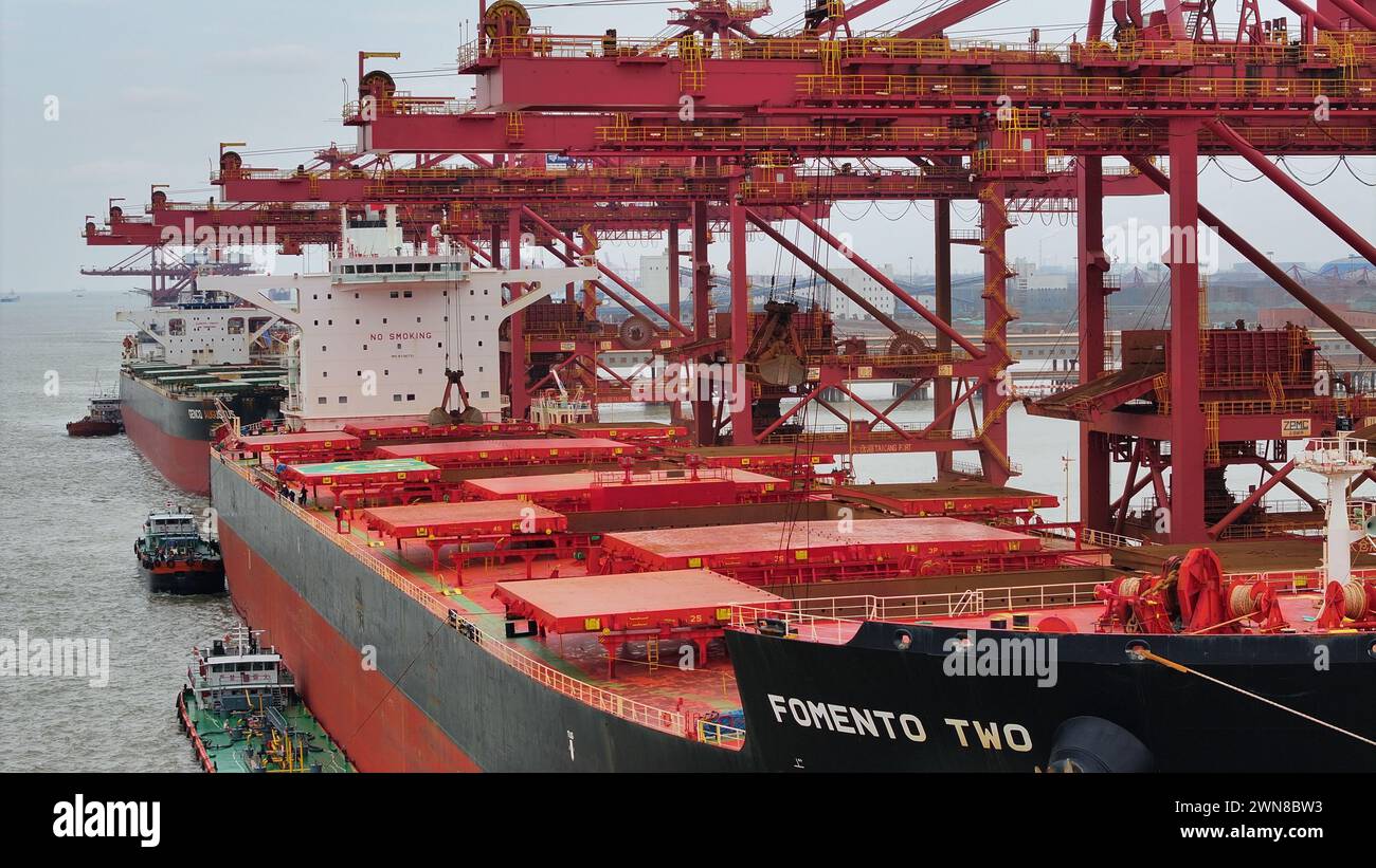 SUZHOU, CHINA - MARCH 1, 2024 - Iron ore imported from abroad is ...