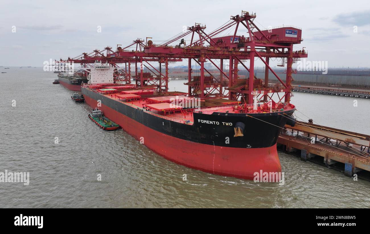 SUZHOU, CHINA - MARCH 1, 2024 - Iron ore imported from abroad is ...