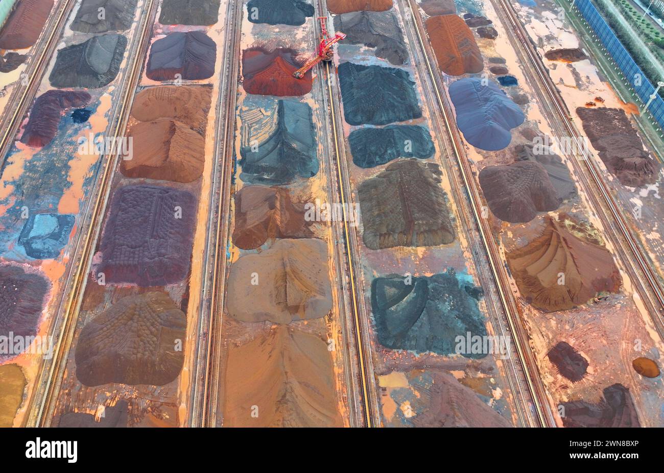 SUZHOU, CHINA - MARCH 1, 2024 - A bucket turbine performs an iron ore ...