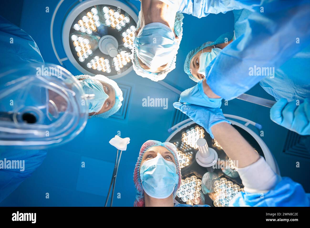 Surgeon and assistants i operating room performing operation Stock ...