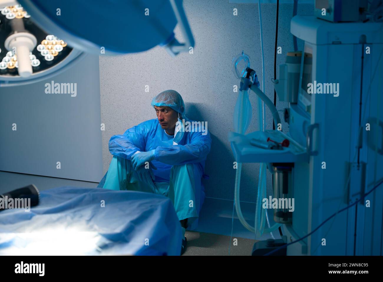 Tired exhausted exhausted surgeon after long surgery doctor in ...