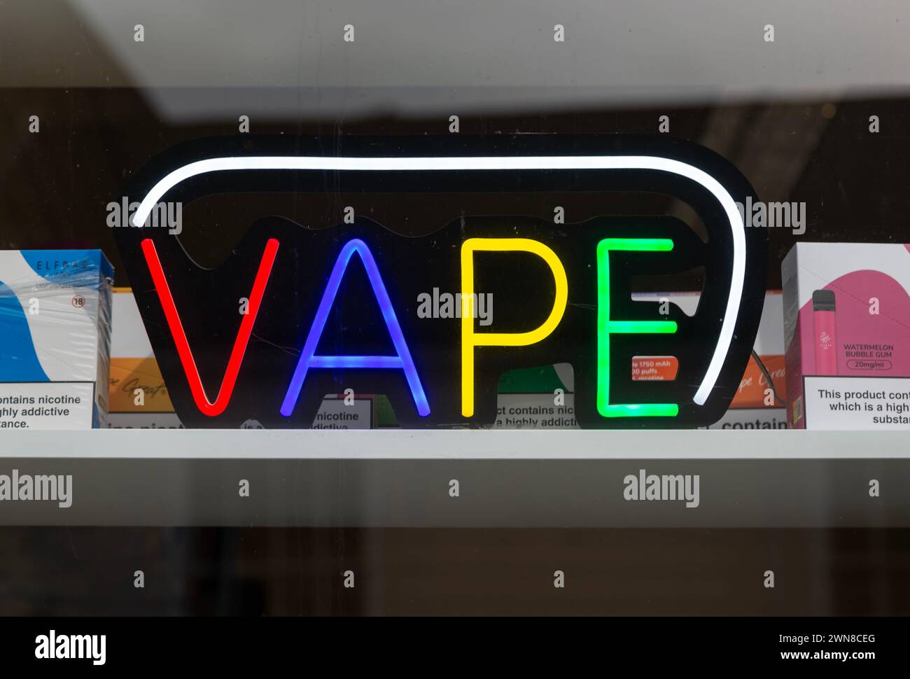 Electric colourful sign for VAPE products in shop window, England, UK ...