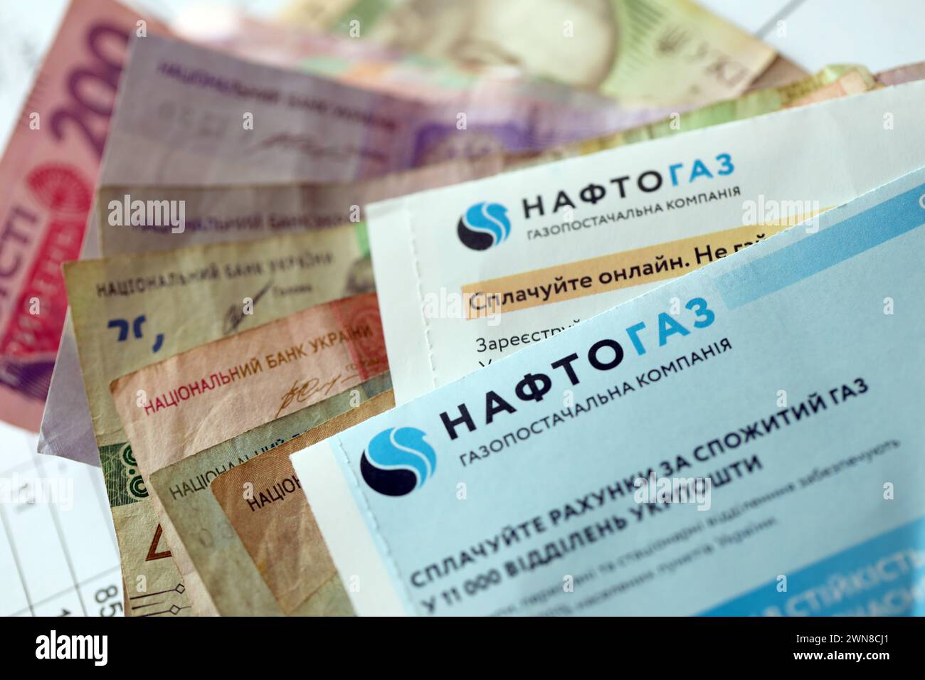 KYIV, UKRAINE - JULY 7, 2023 Naftogaz utility bill document with ...