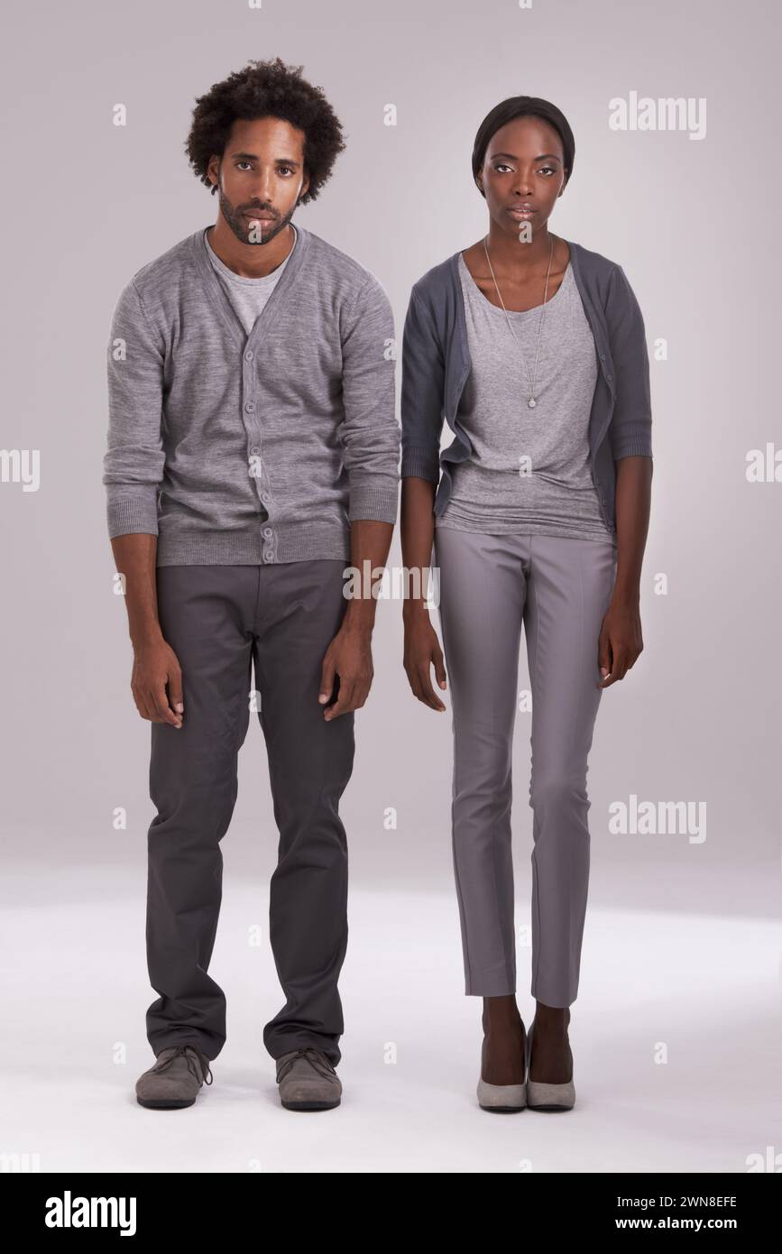 Exhausted, bored and portrait of couple in studio with bad posture for ...