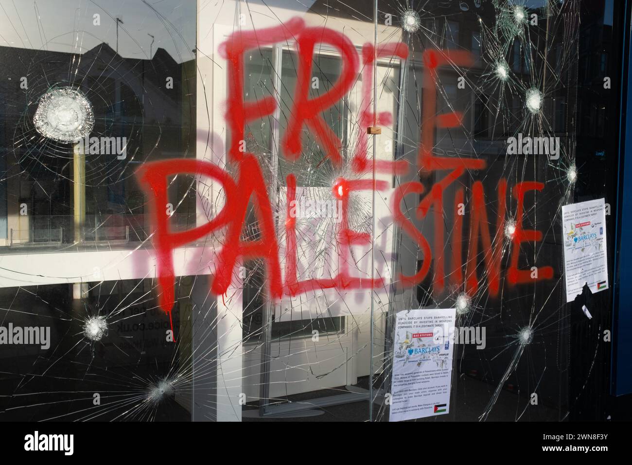 Glasgow, UK, 1st Mar 2024. Smashed windows and graffiti reading ...