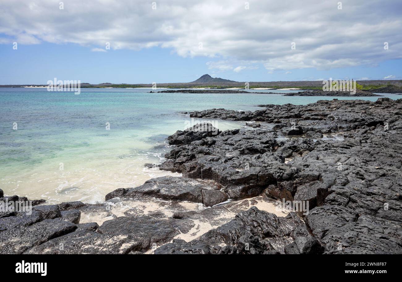 Volcanic rocks on a beach of uninhabited island, Galapagos National ...