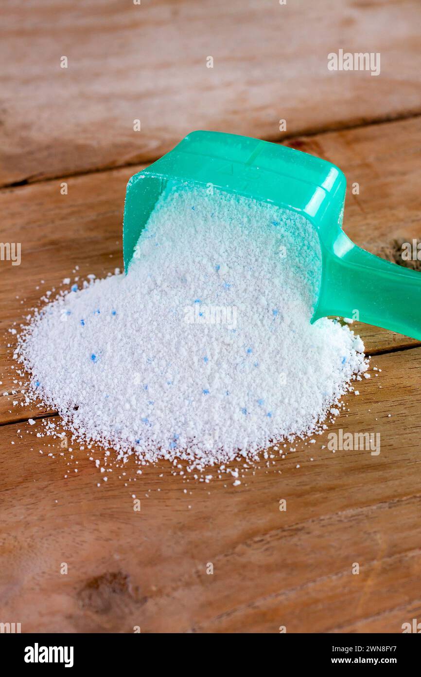 Detergent powder, detergent washing powder in the measuring spoon on ...