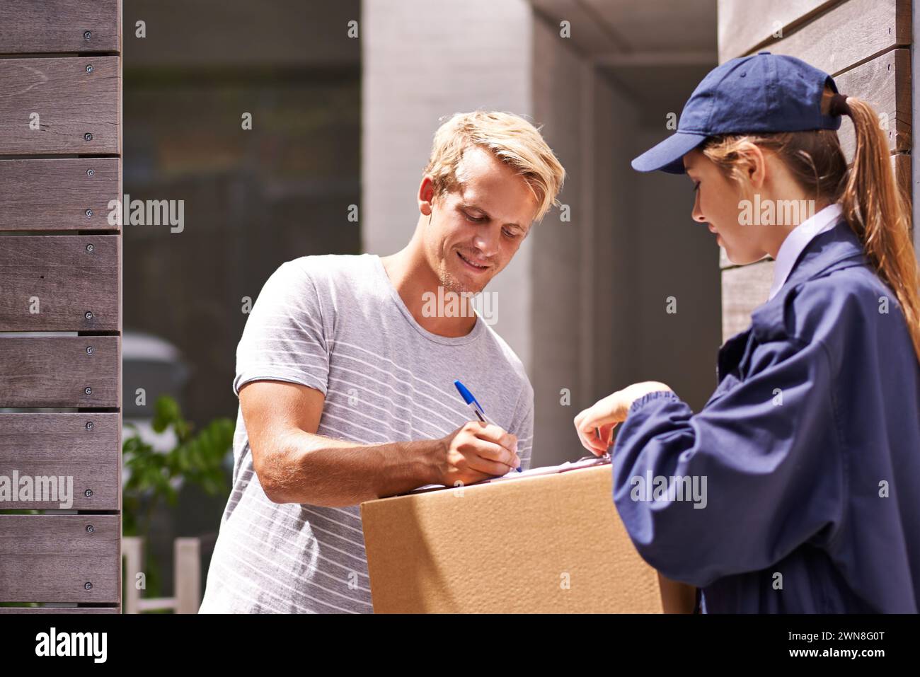Delivery, package and man sign documents, forms and application for ...