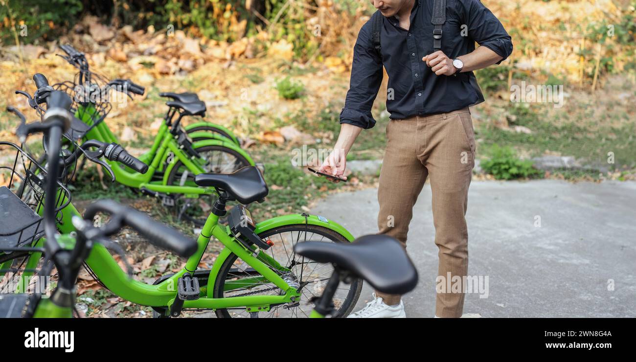 business man holding mobile using bike rental digital phone app ...