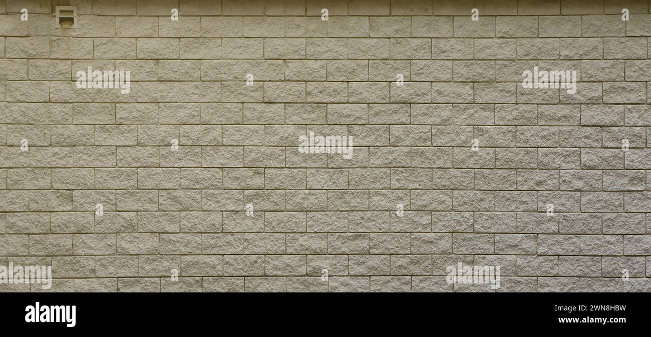 Wall of light texture tiles, stylized in appearance as a brick. One of ...