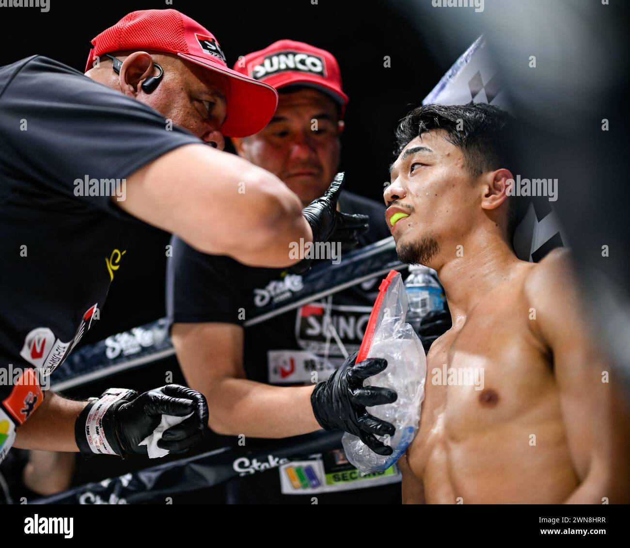 Tokyo, Japan. 24th Feb, 2024. Japan's Junto Nakatani, right, listens to ...