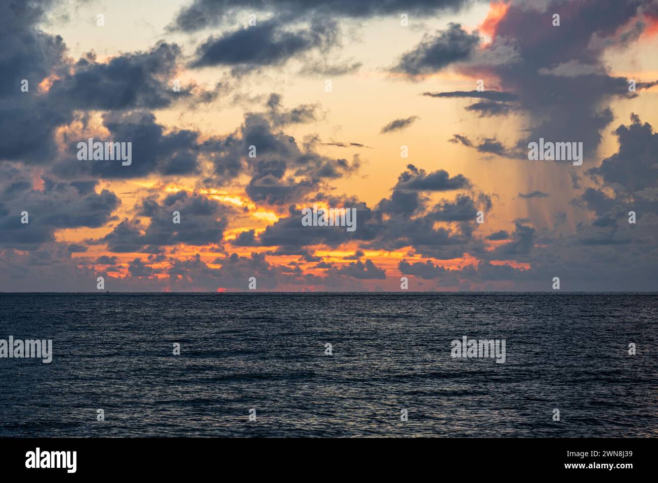 A view of the sunrise over the ocean off Miami Beach, south Florida ...