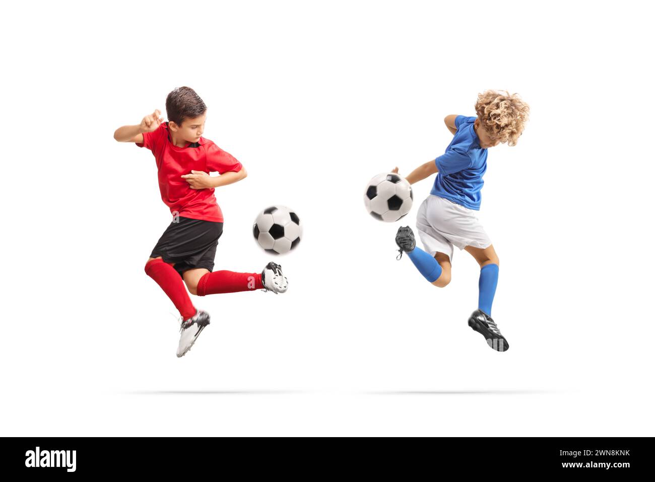 Boys kicking a football with back heel isolated on white background ...