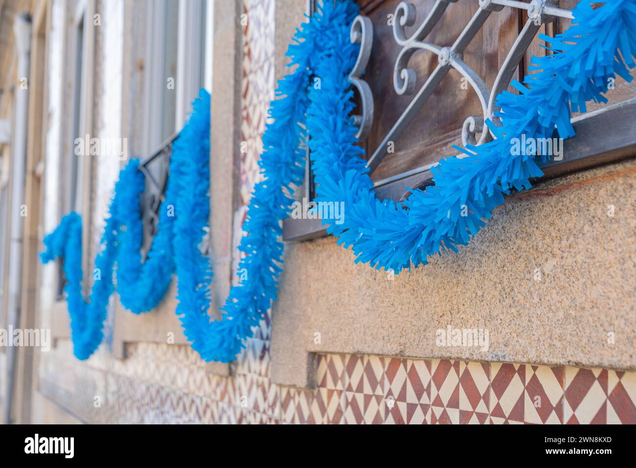 window in Porto city with San Juan festival decorations Stock Photo - Alamy