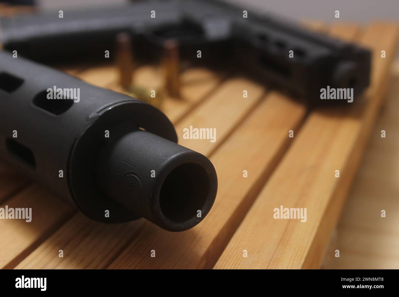 Hand gun table hi-res stock photography and images - Alamy