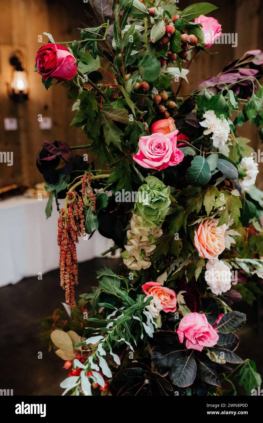 Wedding Floral arrangement pink and red flowers Stock Photo - Alamy