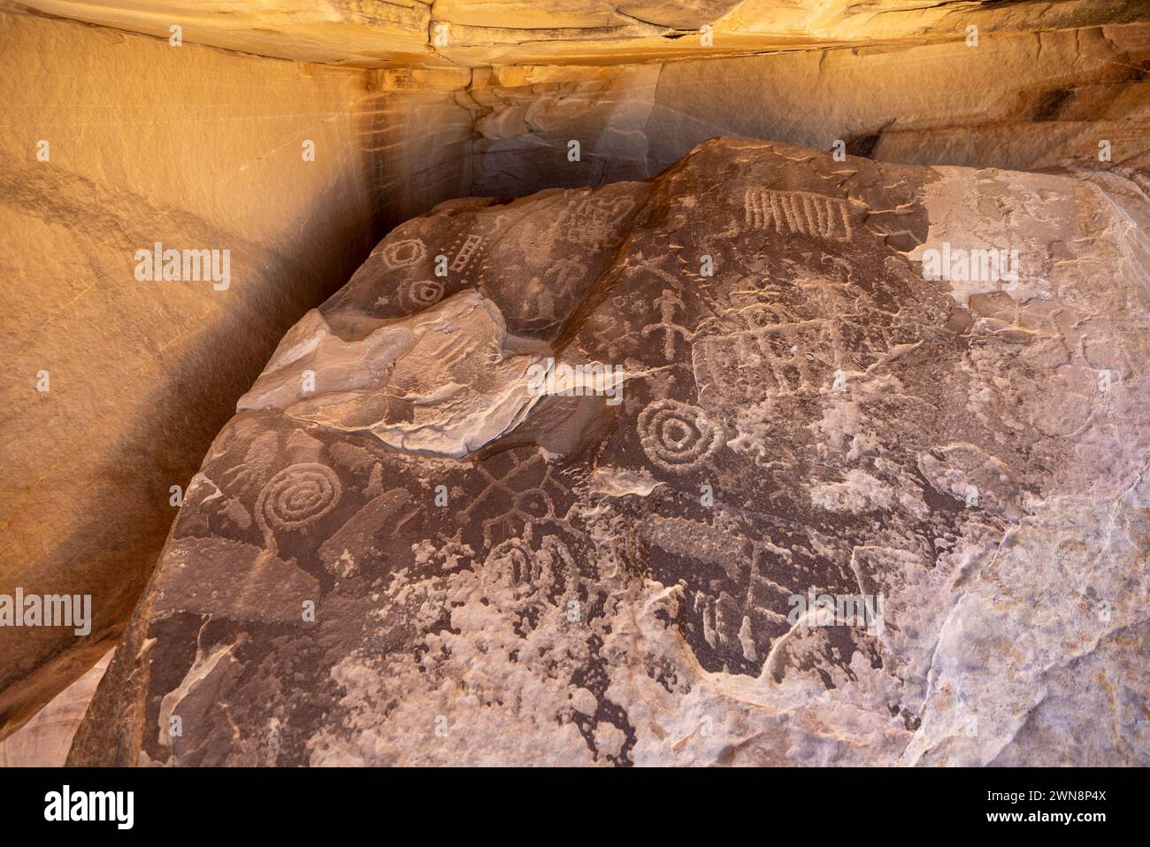 ancient petroglyphs etched into the rocks Stock Photo - Alamy