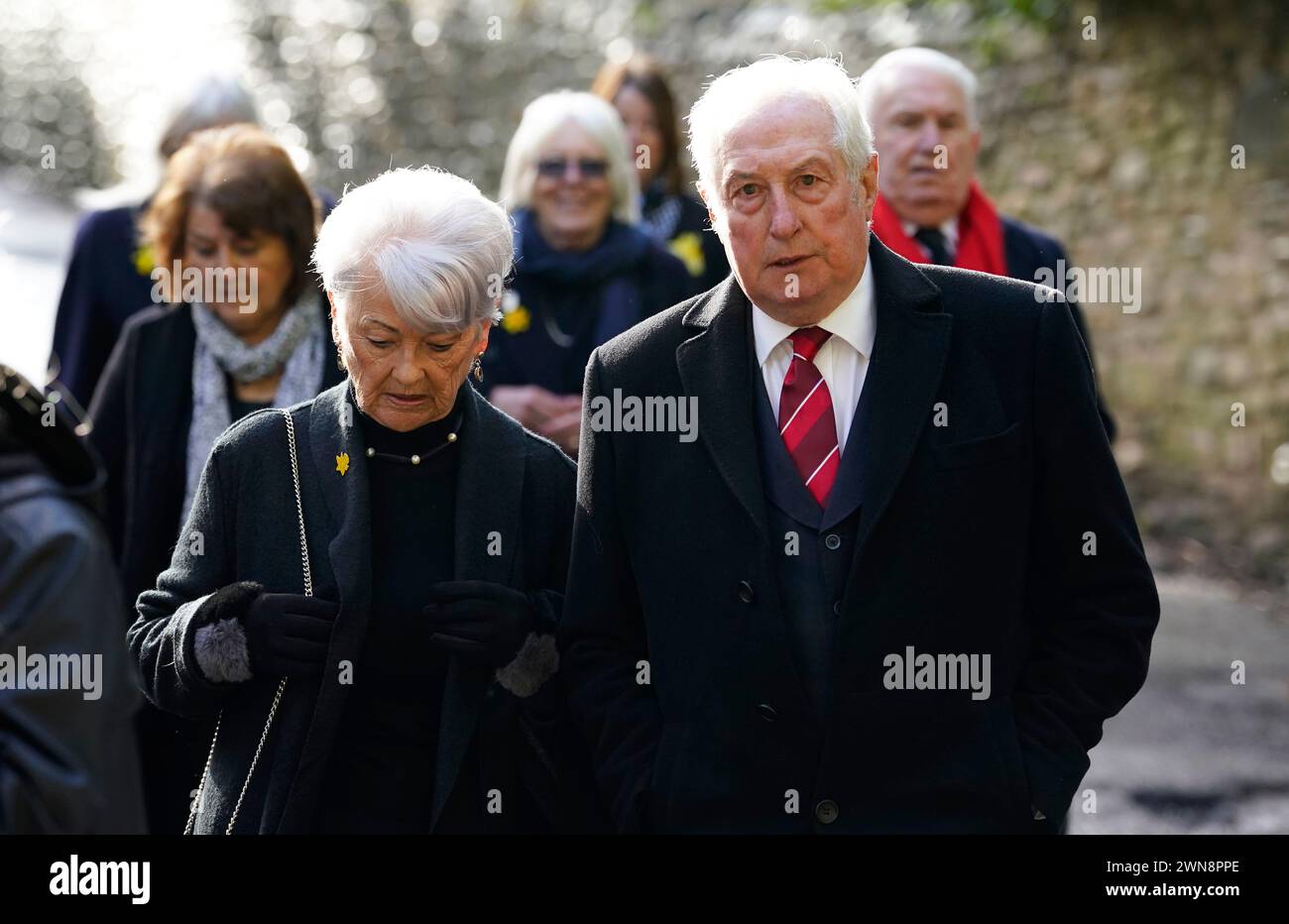 Sir Gareth Edwards arrives with wife Maureen for a memorial service for ...