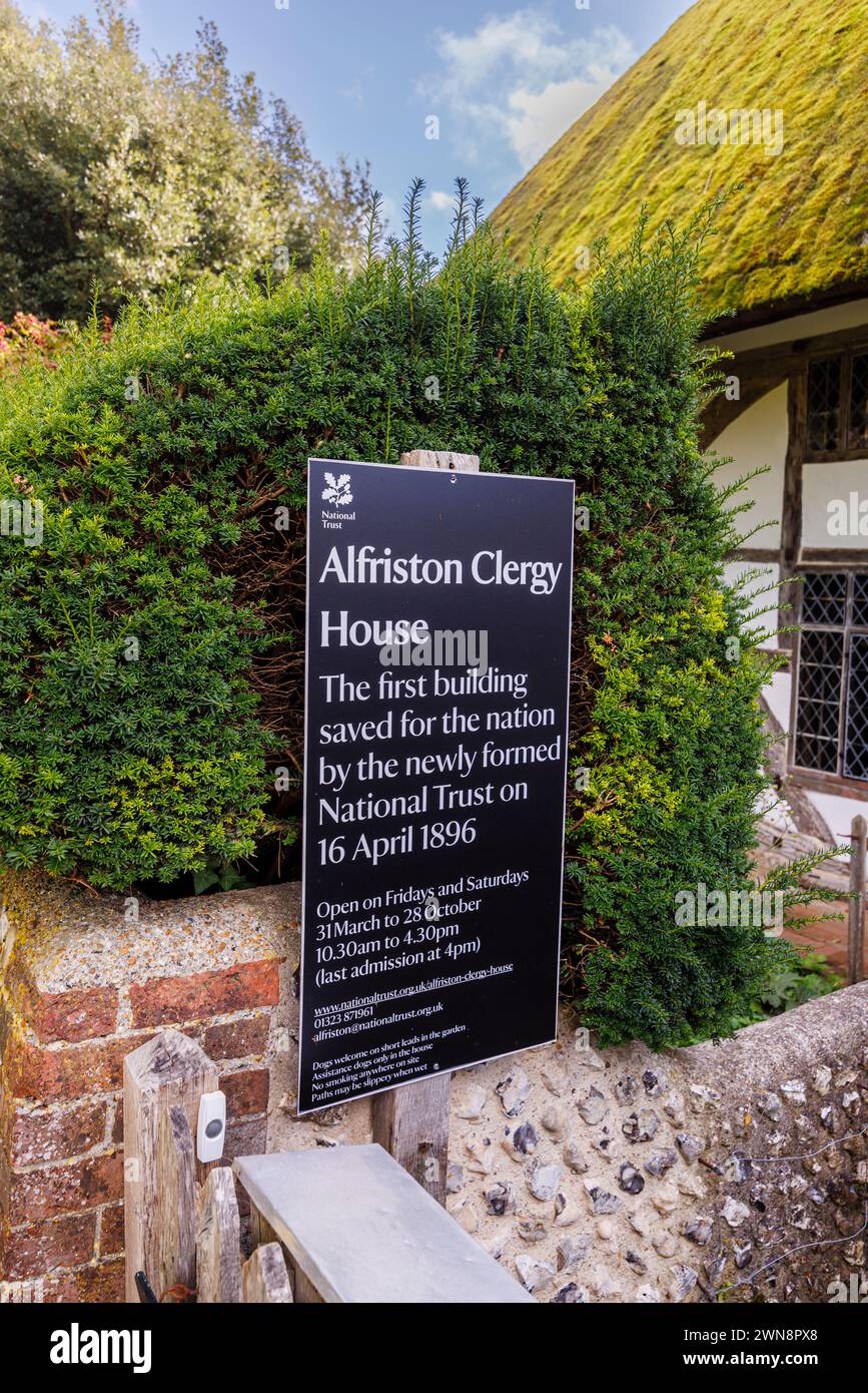 Entrance sign at Alfriston Clergy House, Alfriston, a historic village ...