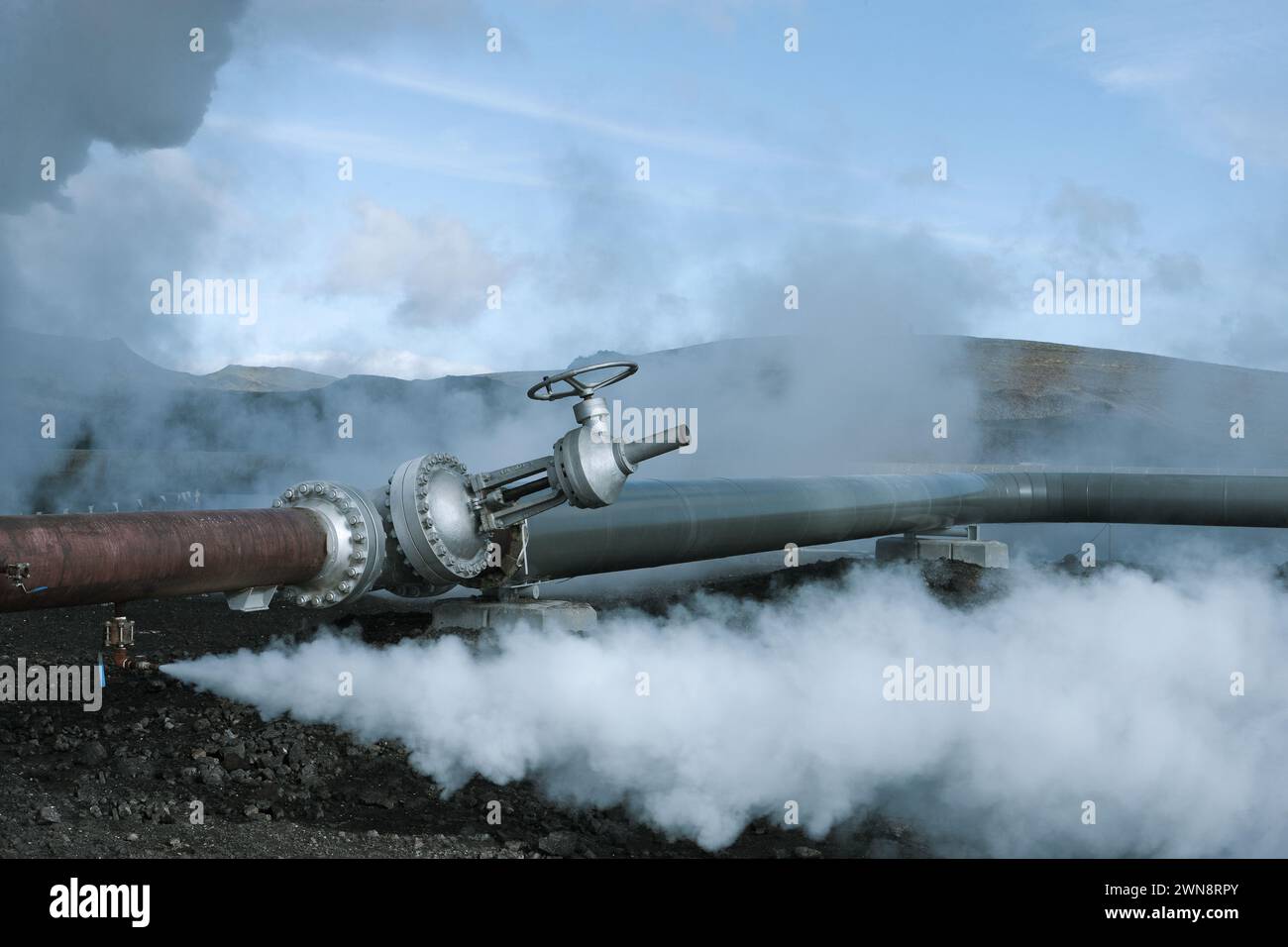 Valve at a geothermal power plant Stock Photo - Alamy