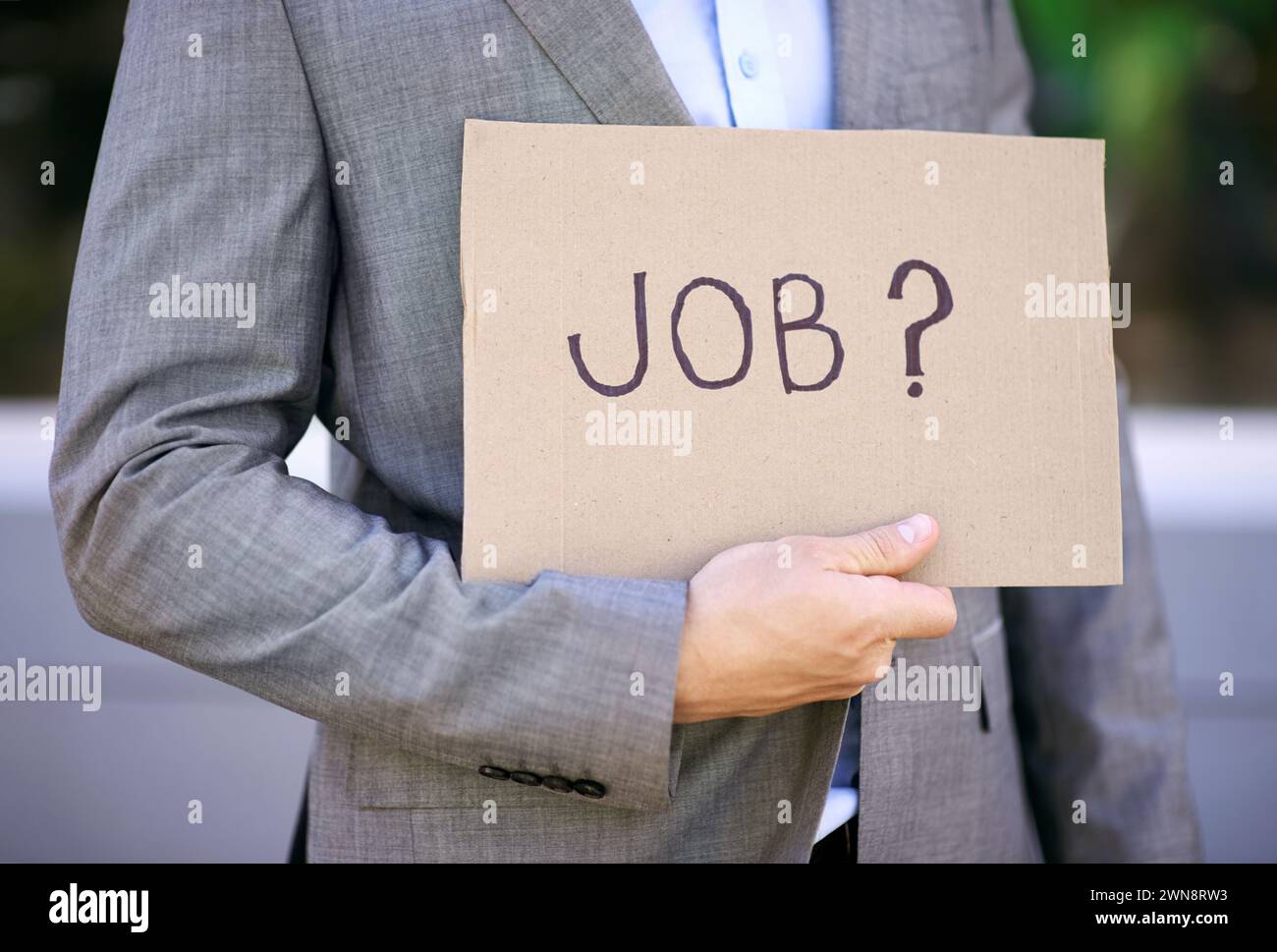 Hand, businessman and board for unemployed, jobless and poverty for ...