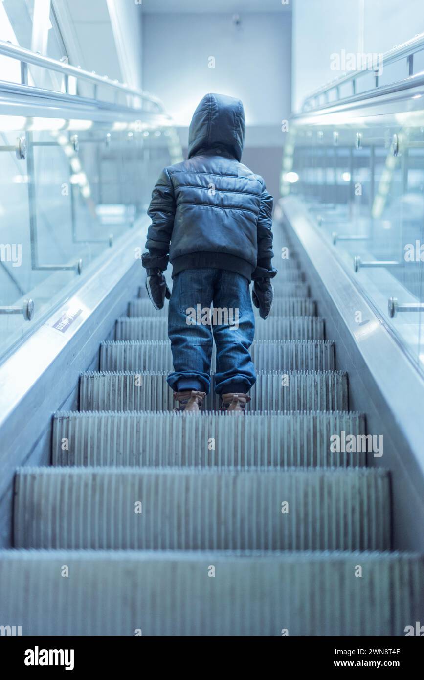 Young Boy Standing on Escalator in Metro, Copenhagen, Denmark Stock ...