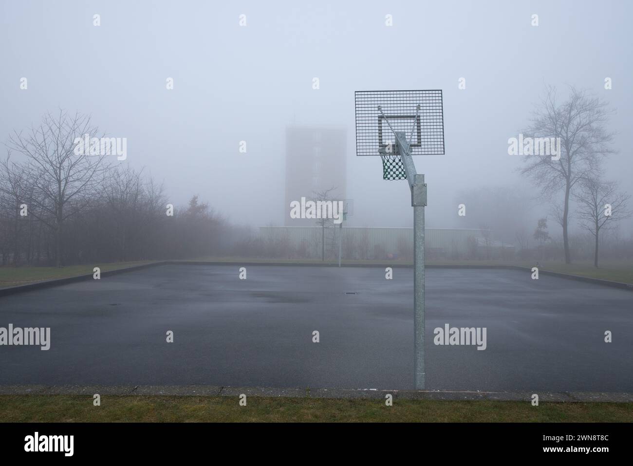Basketball Court on Misty Morning Stock Photo - Alamy