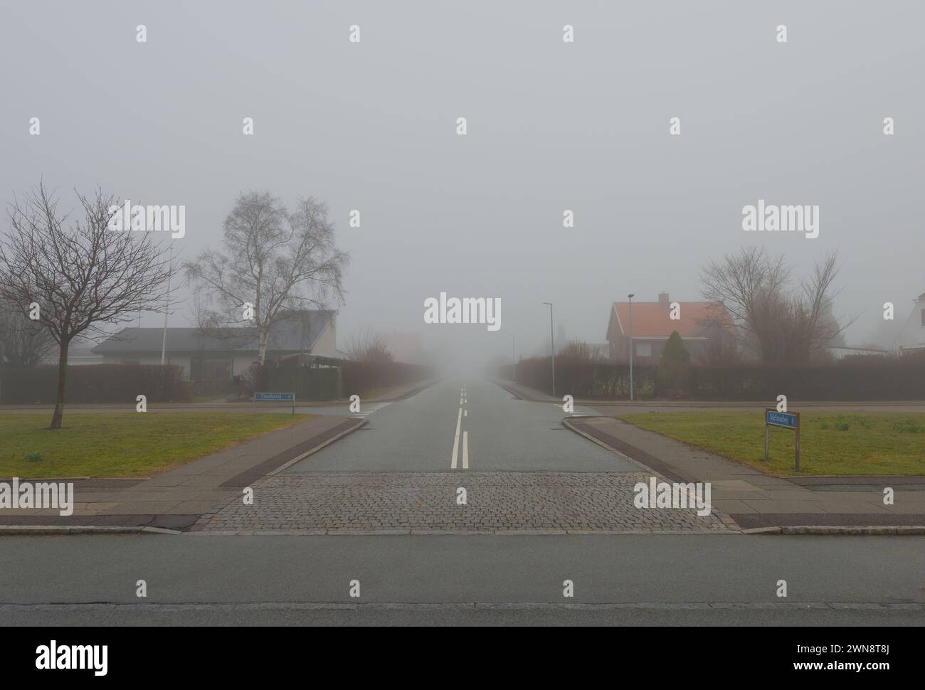 Dense Fog laying over Suburban Neighbourhood in Morning Stock Photo - Alamy