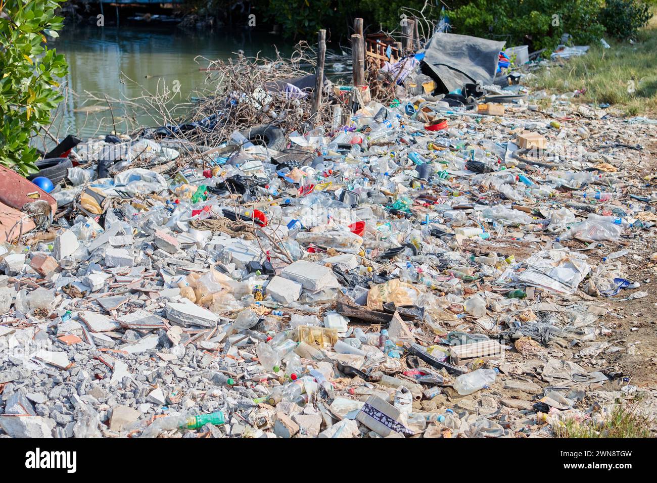 Lot of plastic waste on the side of the road Stock Photo - Alamy