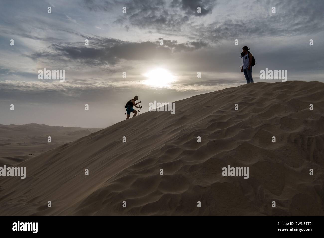 Two men carrying sticks hi-res stock photography and images - Alamy