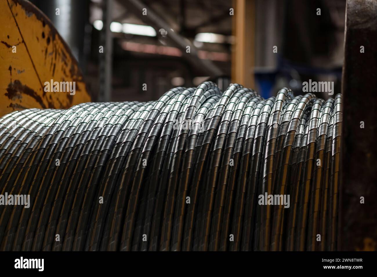 Close up Wooden Coils Of Electric Cable in factory . High and low ...