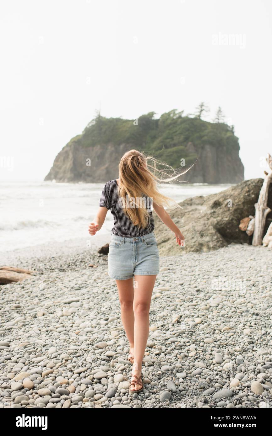 Wind blowing blonde hair woman beach hi-res stock photography and ...
