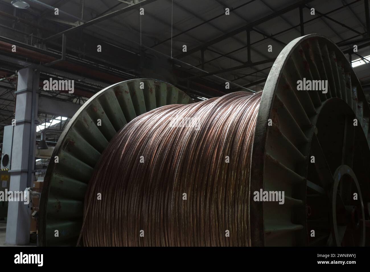 Close up Wooden Coils Of Electric Cable in factory . High and low ...