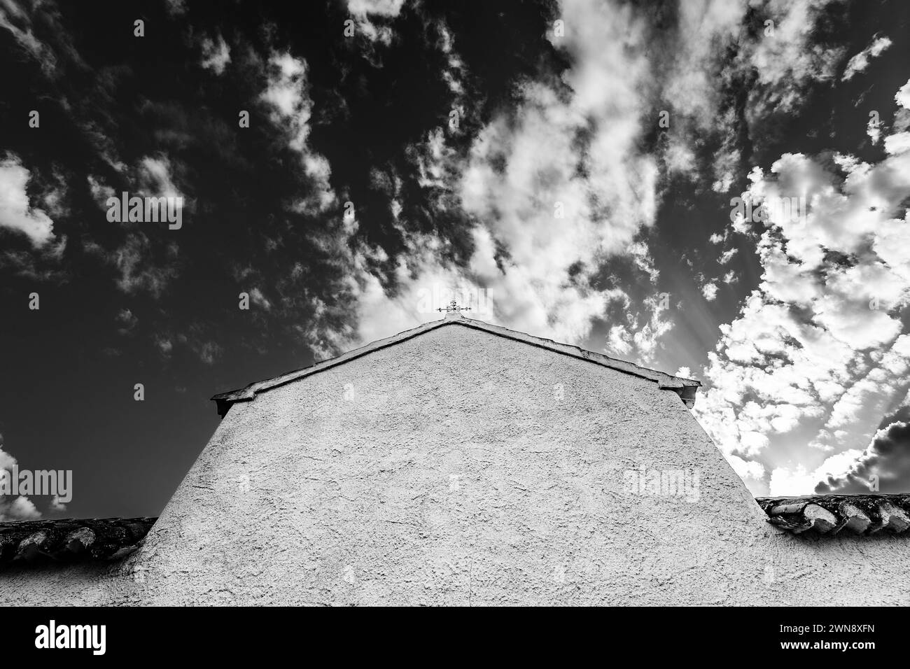 Cemetery house with cross on the roof Stock Photo - Alamy