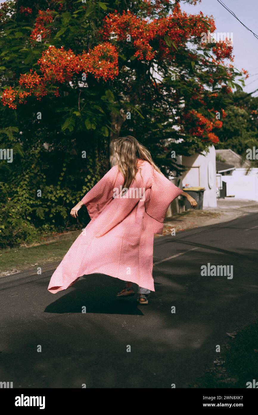 Young european woman walks down hi-res stock photography and images - Alamy