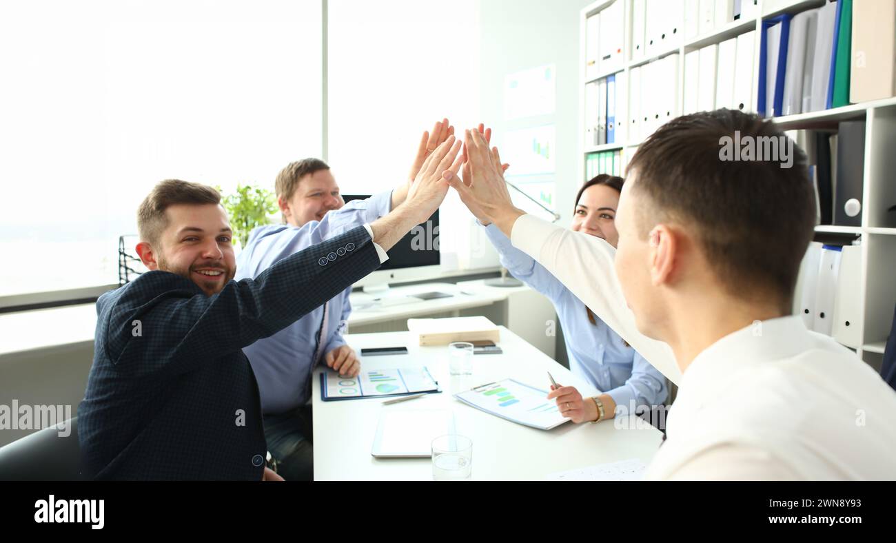 Group of businessman and businesswoman celebrating victory Stock Photo ...