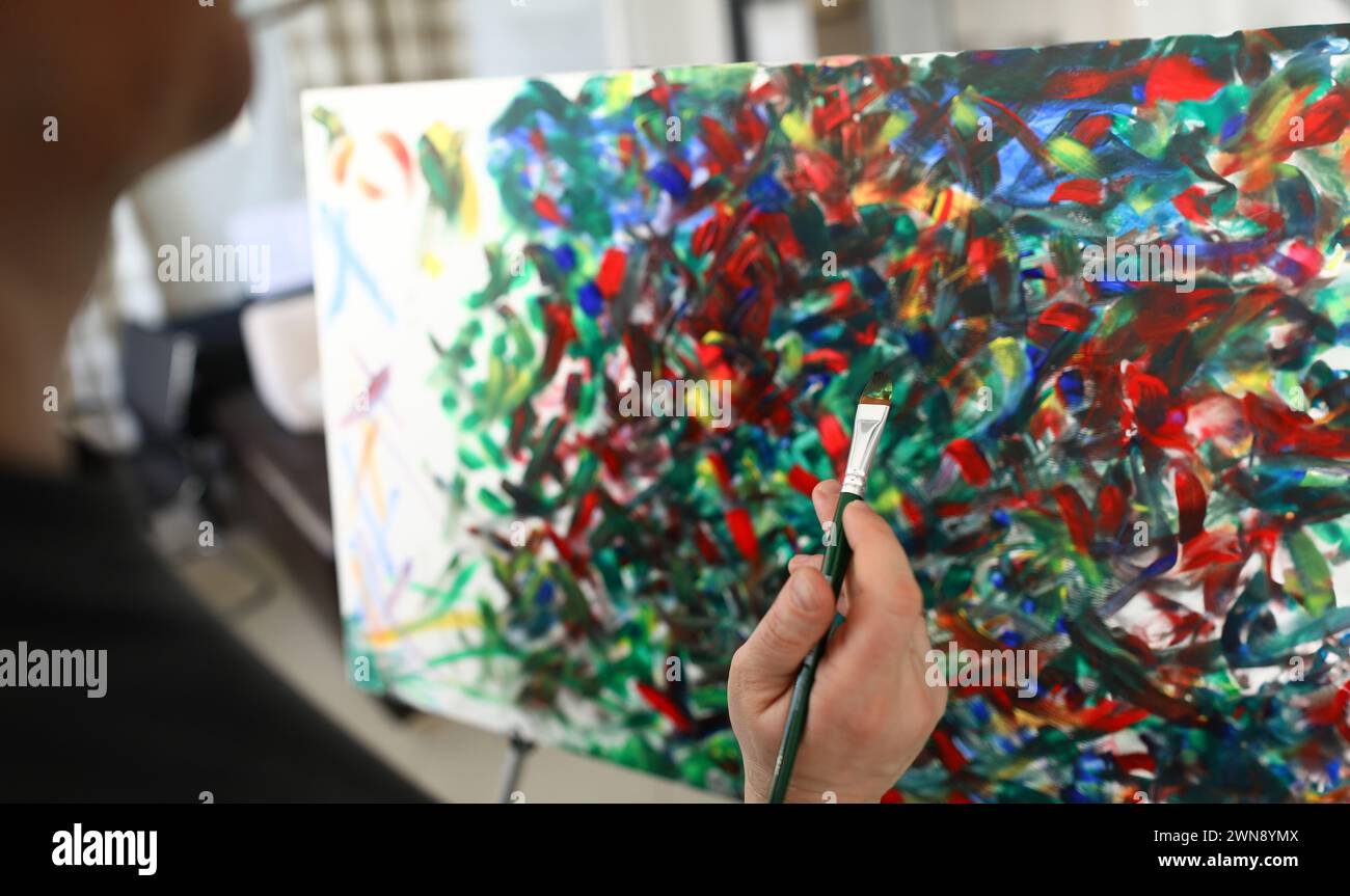Male artist colourful palette hi-res stock photography and images - Alamy