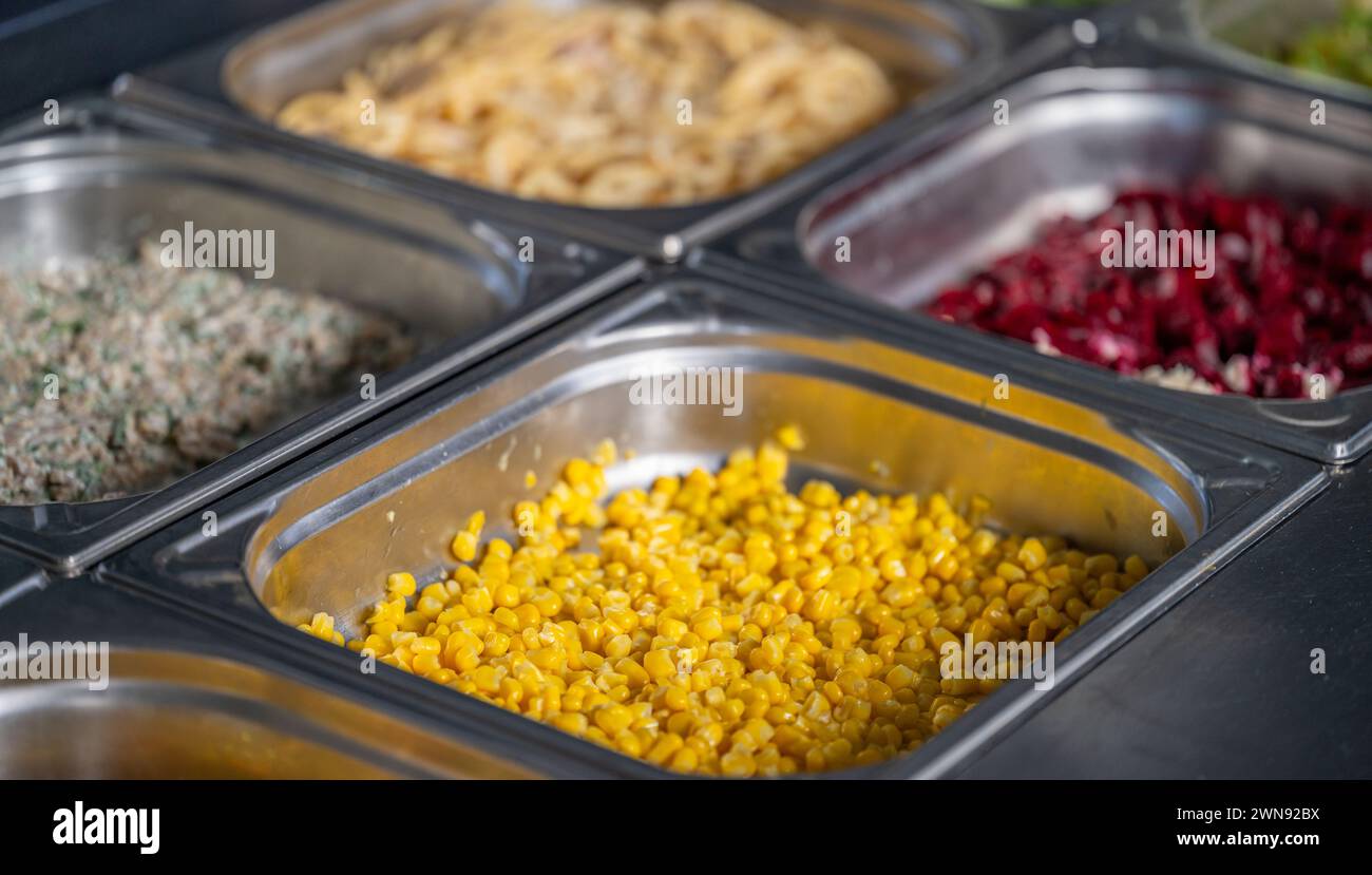 Boiled corn kernels in self-service tray Stock Photo - Alamy