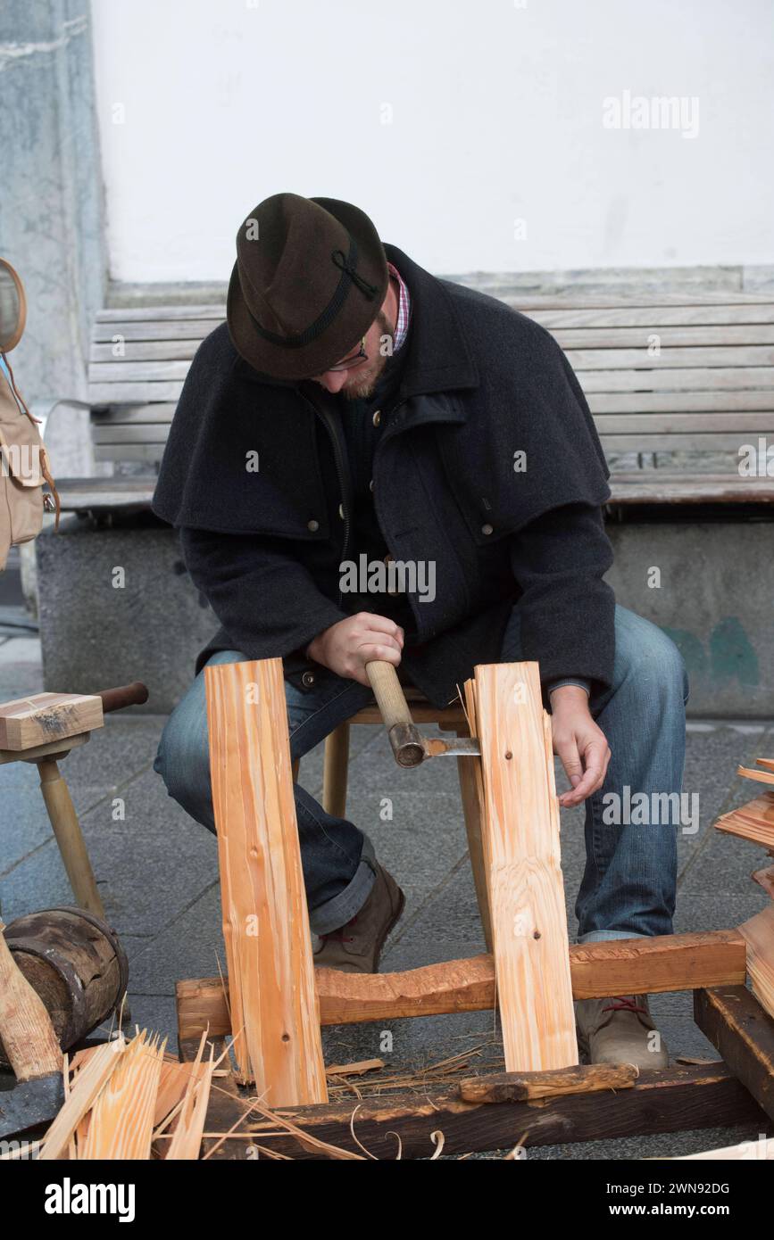 producing wooden roof shingles, a traditional craft, construction with ...