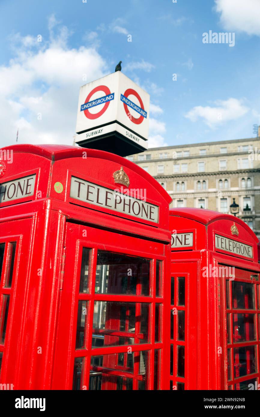 Telephone boxes and underground sign Stock Photo - Alamy
