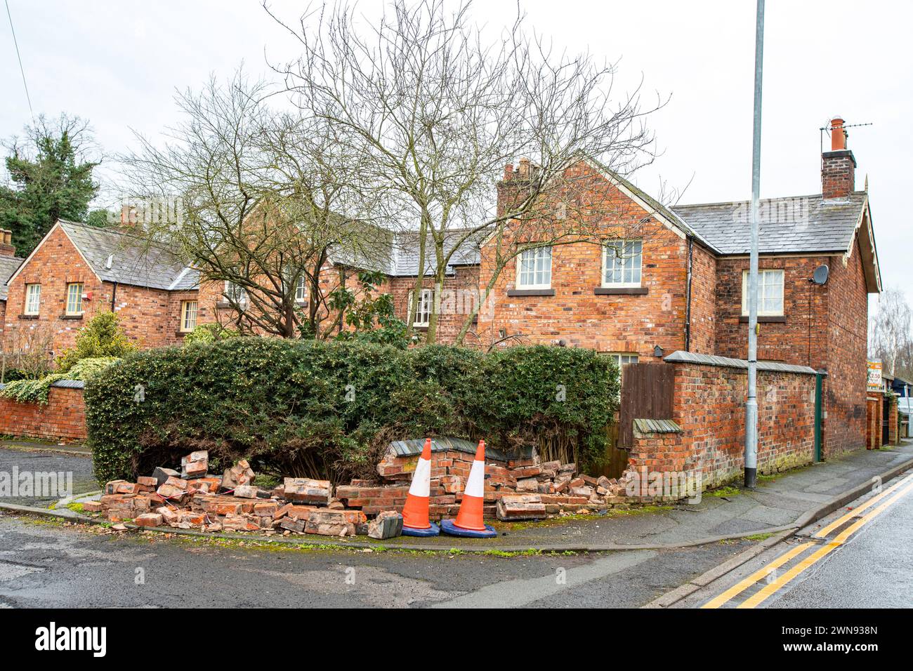 Damaged brick wall hit by vehicle in town centre of Crewe UK Stock ...