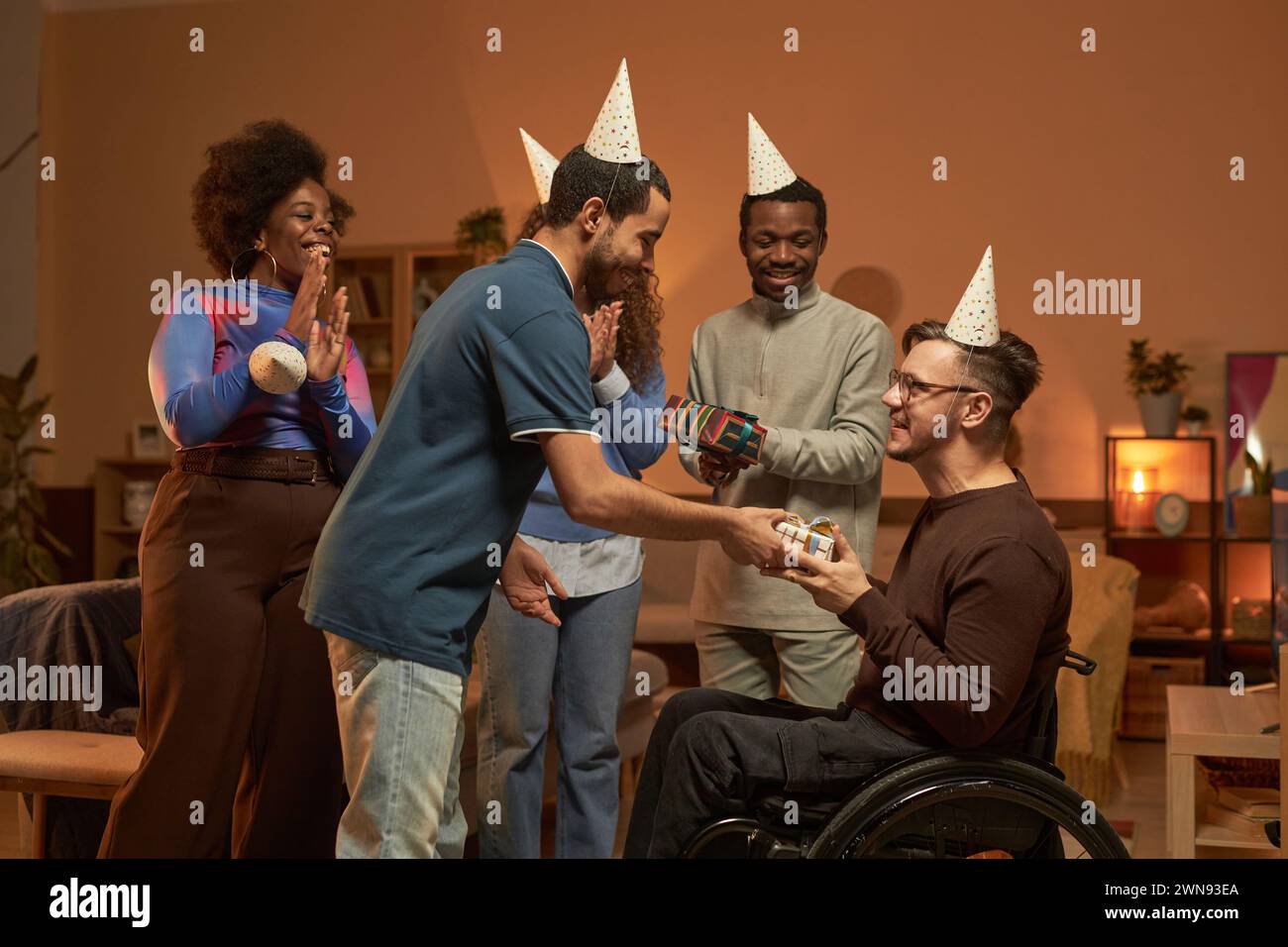 Side view portrait of adult man with disability celebrating Birthday ...