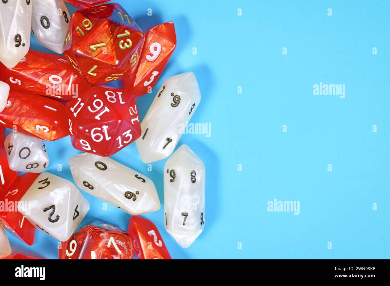 Roleplay game background with different red and white RPG dices at side ...