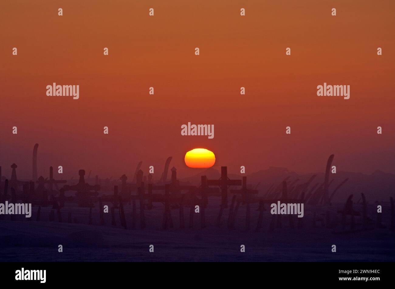 Sunset over graveyard site marked by whale rib bones outside the oldest ...